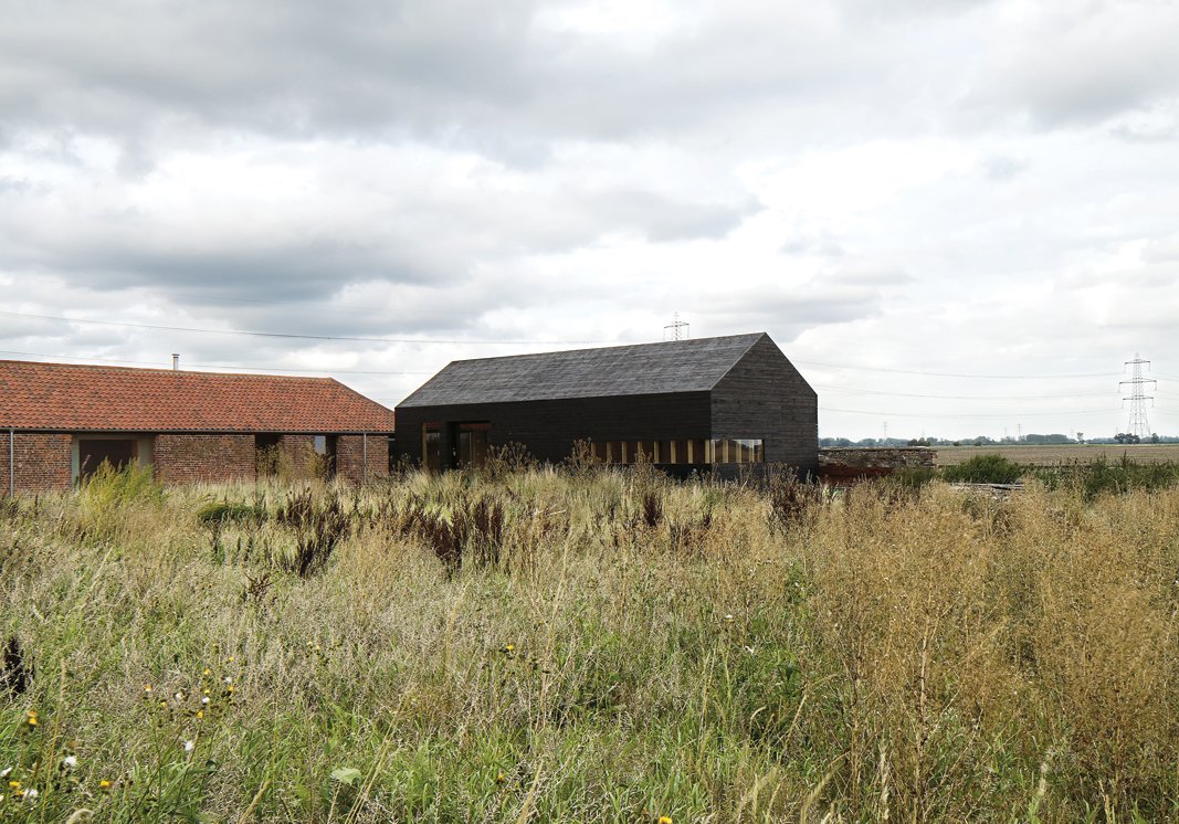 Dwell - A Pair of English Barns Hide Unabashedly Bold and Budget ...